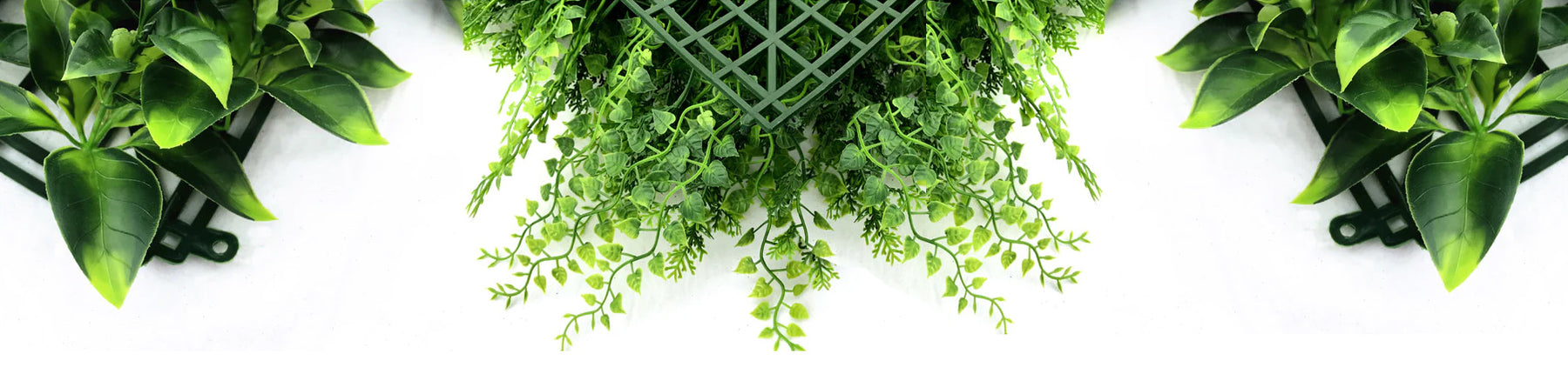 artificial hedge. fake hedge. plastic plants. green wall. faux foliage